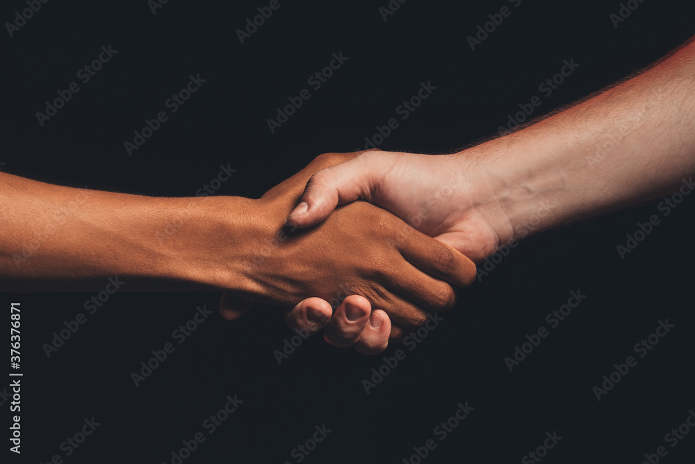 Different Races Shaking Hands