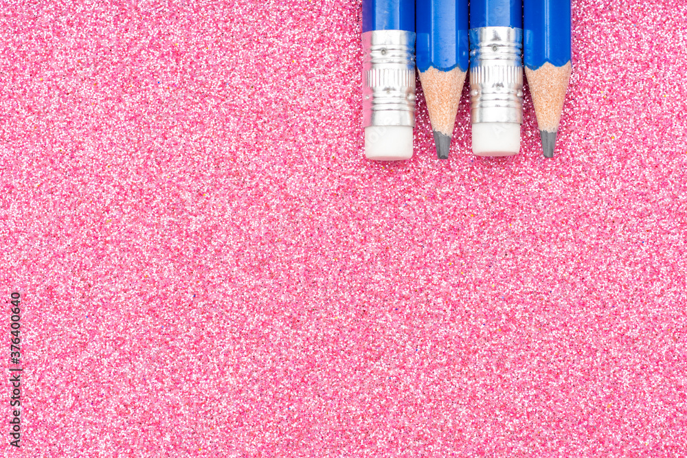 Pink school background with blue pencils Stock Photo | Adobe Stock