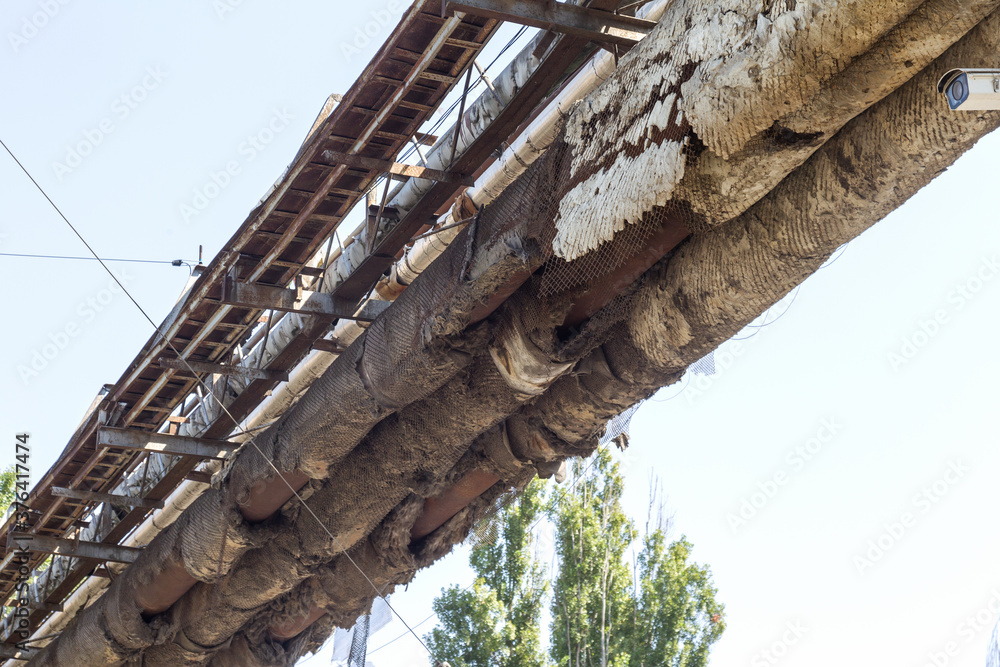 Overground heat pipes. Pipeline above ground, conducting heat for ...