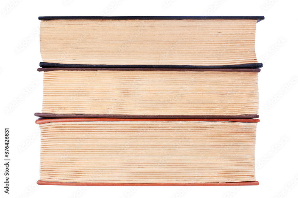Three closed old thick paper books with yellow pages white background ...