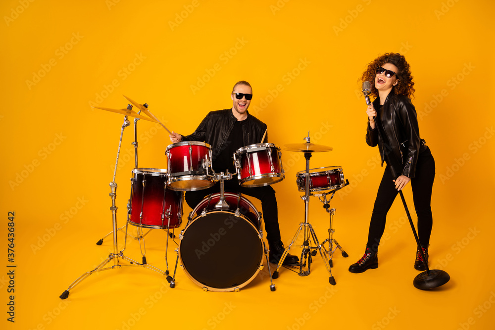 Full size photo of famous rock group guy plays instruments beat drum ...
