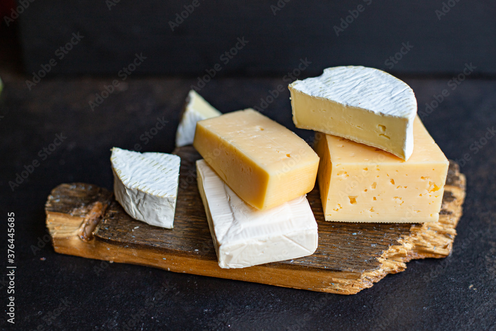 cheese assortment different types of hard and soft cheeses serving size ...