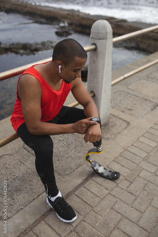 Black African American Man with prosthetic leg performing using ...