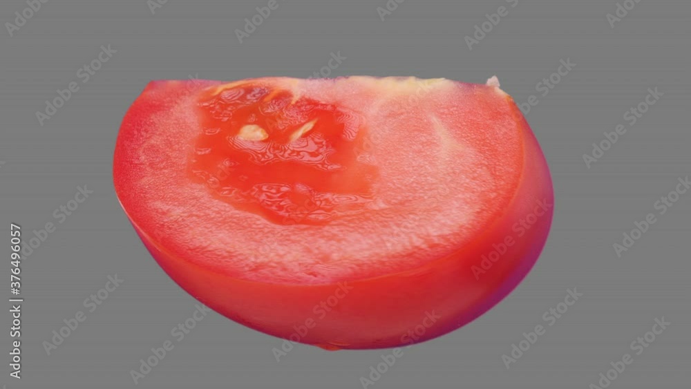 Fresh tomato slice spin and float - isolated on neutral gray. Seamless ...