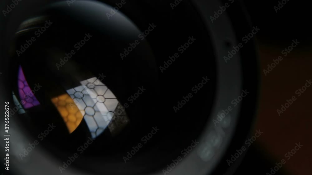 A movement of the aperture flaps on the camera lens. Aperture photo ...
