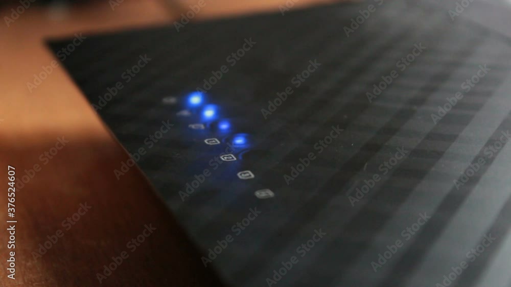 Blinking of the signal indicator on the Wi-Fi router. Wi-Fi router with ...