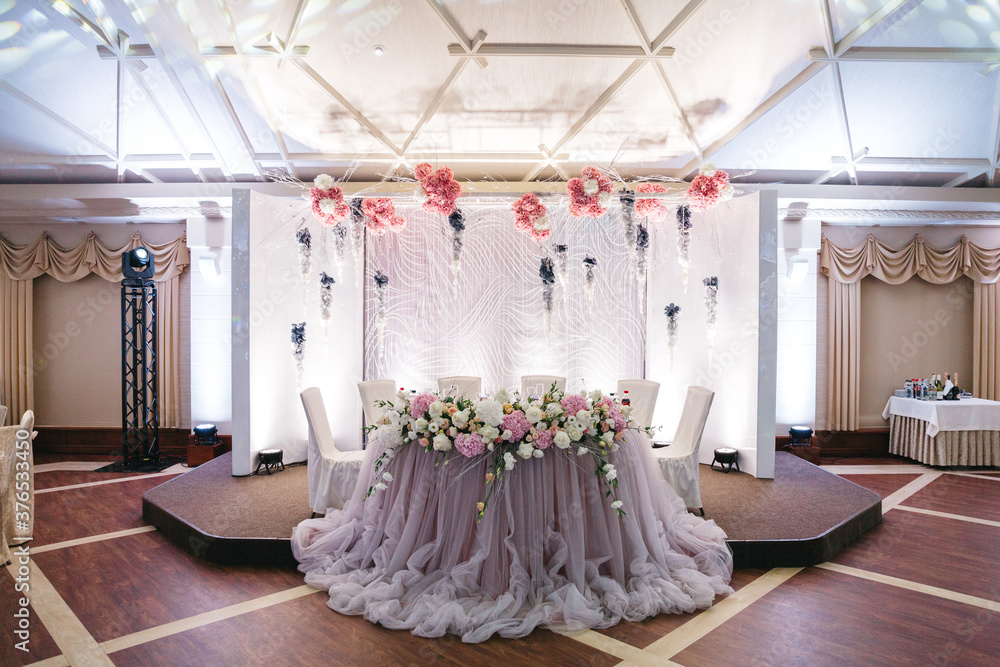Full view of beautiful wedding hall in dim violet color, decorated ...