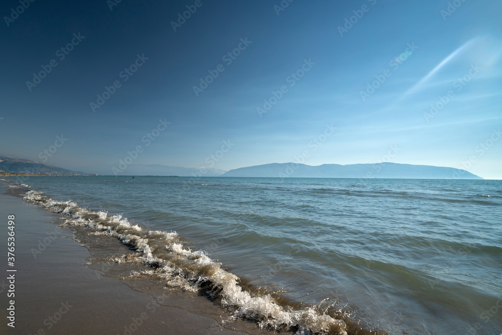 View of the beach on zvernec. On the horizon is the Peninsula of ...