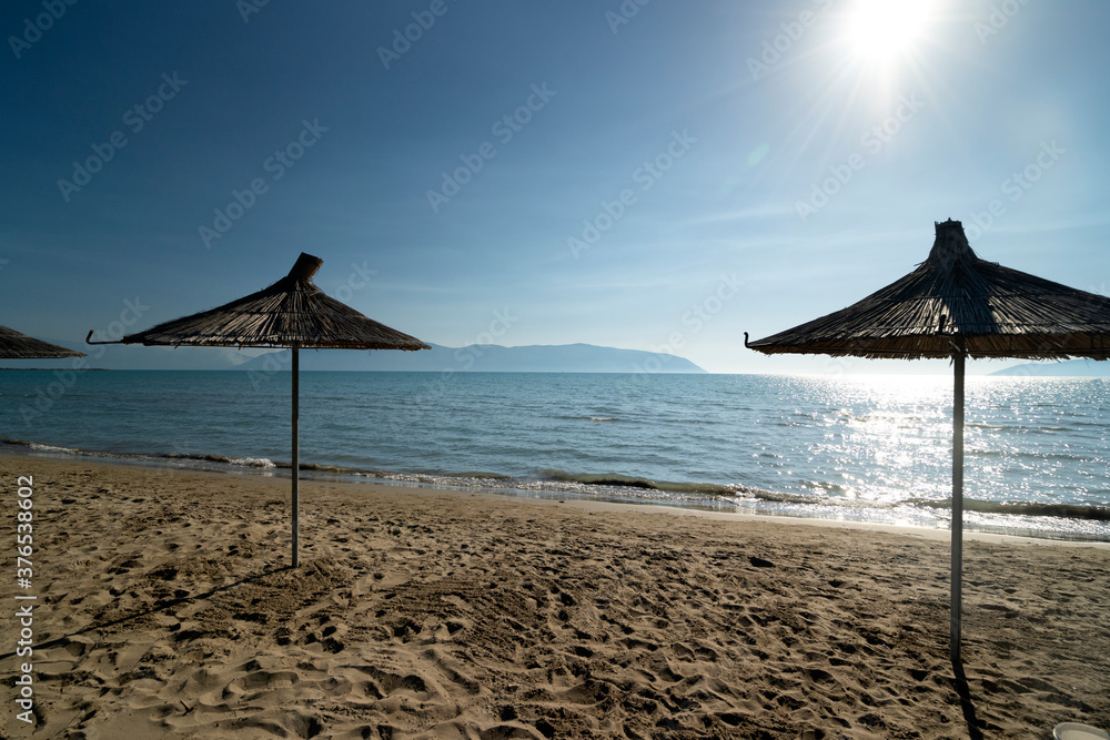 View of the beach on zvernec. On the horizon is the Peninsula of ...