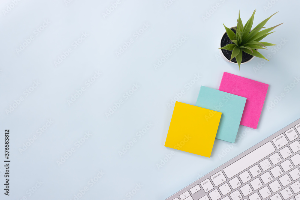 3 Color Stick Note and Office Plants and Computer Keyboard on Modern ...
