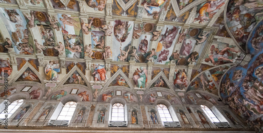 Interior of the Sistine Chapel painted by Michelangelo in Vatican City ...