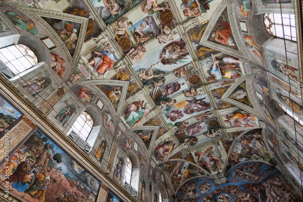 Interior of the Sistine Chapel painted by Michelangelo in Vatican City ...