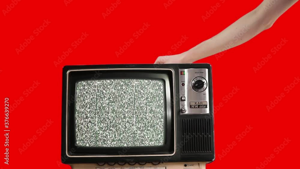 Male Hand tuning the Antenna of an Old Television with Green Screen ...