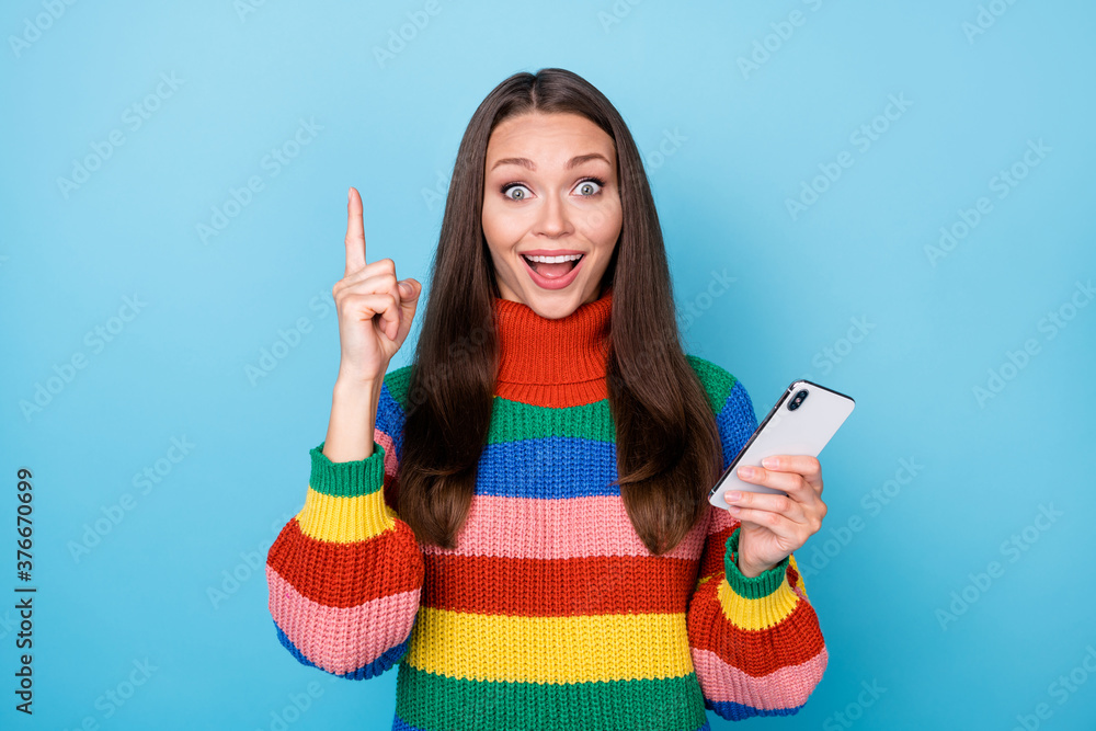 Portrait excited girl use smartphone think thoughts get incredible idea ...