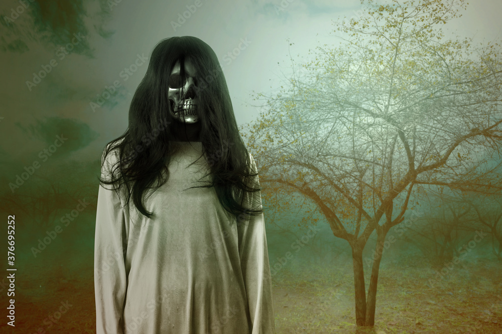 Scary ghost woman standing with haunted forest background Stock Photo ...