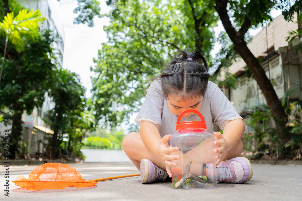 An Asian girl Portrait, she is adventuring in a wide world. Along with ...
