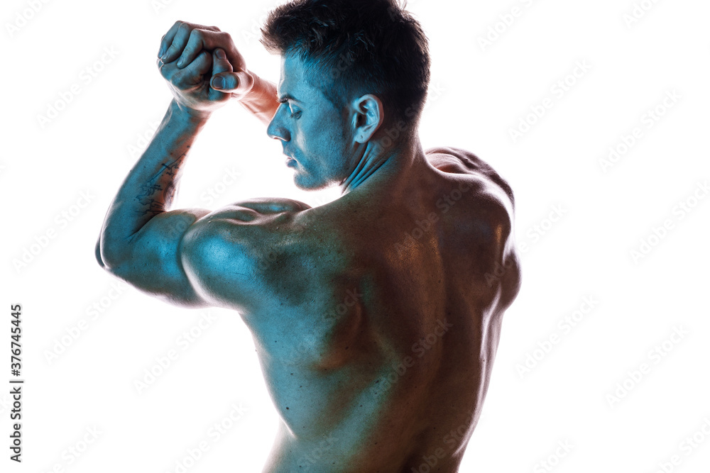 Model sports young man on white background. Sporty muscle guy showing ...