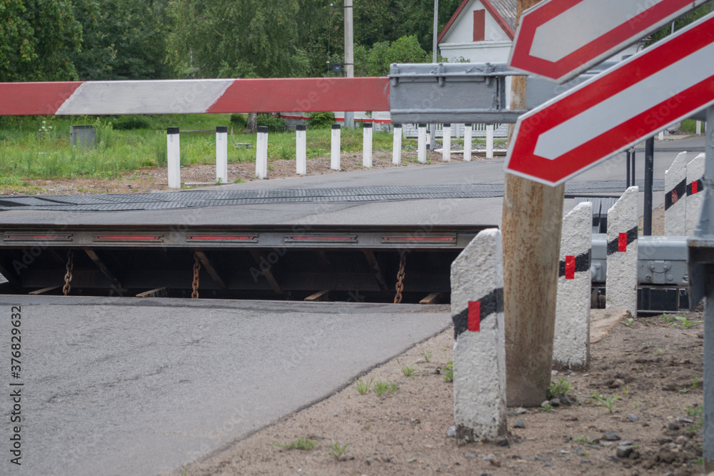 Working part of mechanism of railway crossing barrier device in raised ...