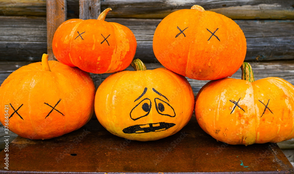 halloween concept. Pile of pumpkins with an ax for chopping. Horror ...