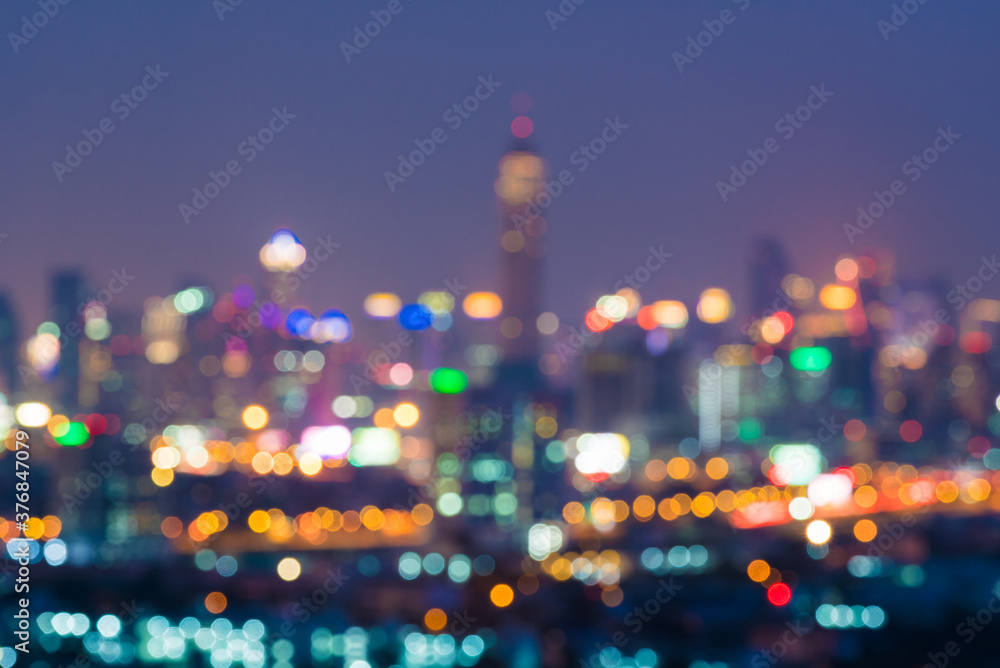 Blurred night downtown city, building background with light bokeh scene ...