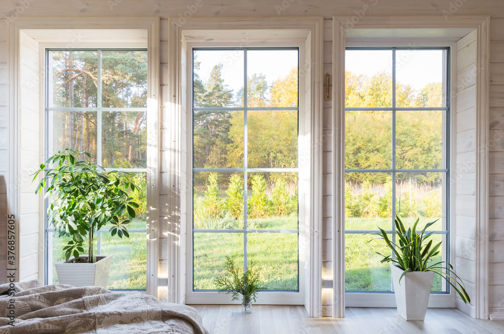 Bright photo studio interior with big window, high ceiling, white ...