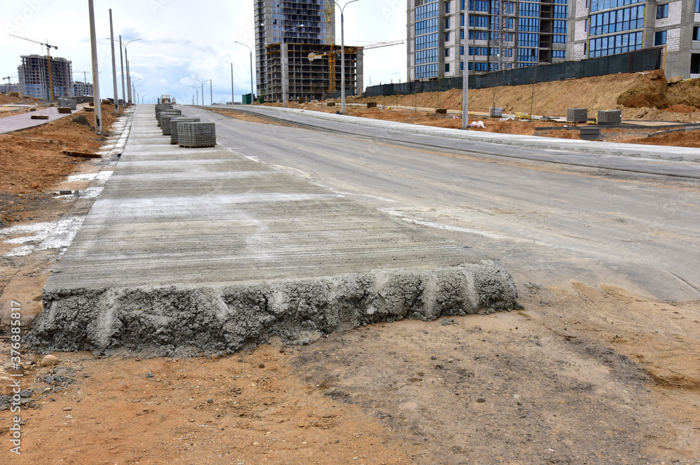 Road works activity at construction site. Construction and development ...
