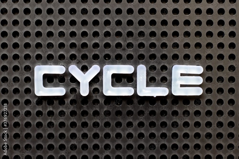White color alphabet with word cycle on black pegboard background Stock ...