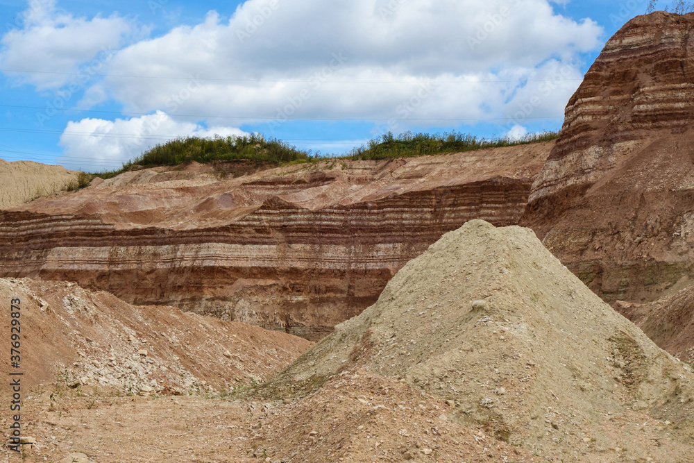 Overview of the walls of an industrial quarry. It can be seen the ...