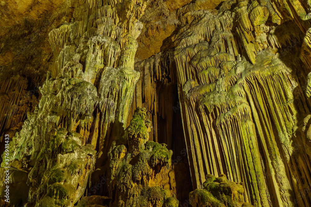 Stalactite column & wall covered by similar formations inside karst ...