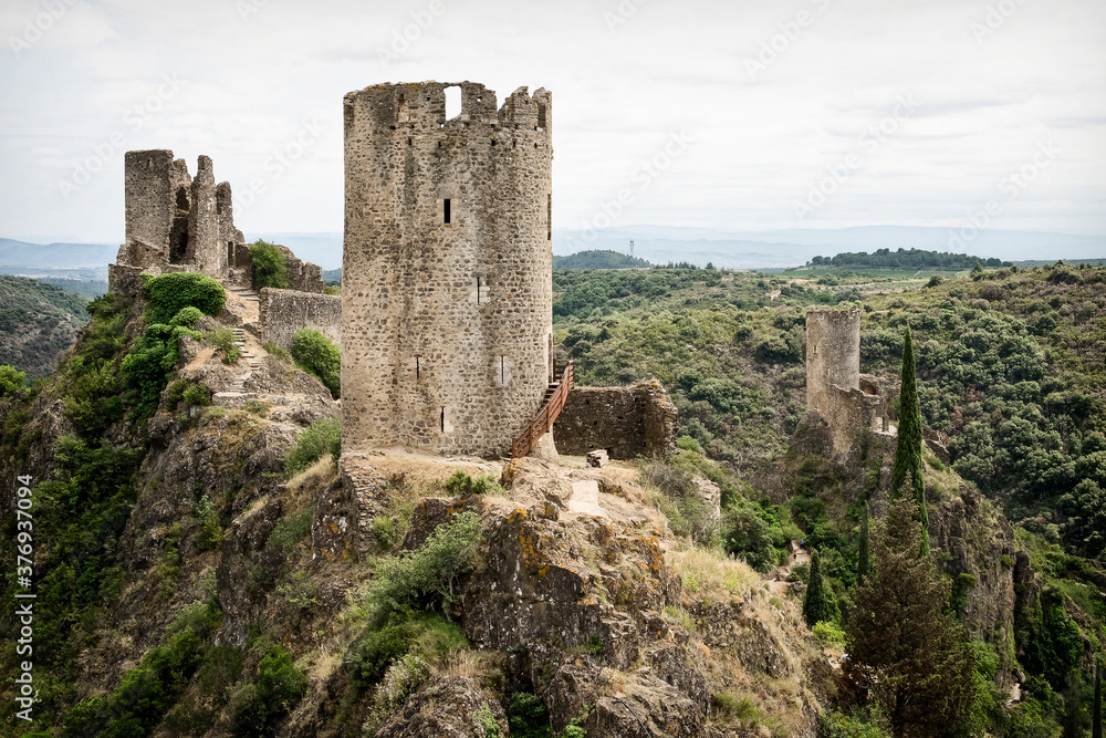 Ruins of four medieval cathar castles Lastours in the mountain valley ...