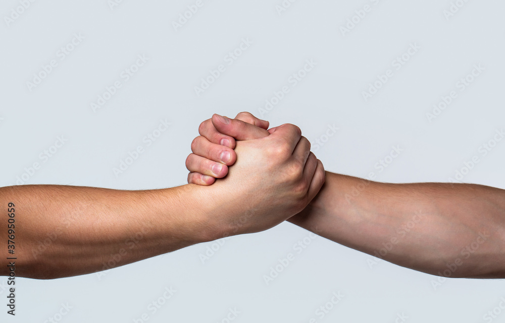 Friendly handshake, friends greeting, teamwork, friendship. Rescue ...