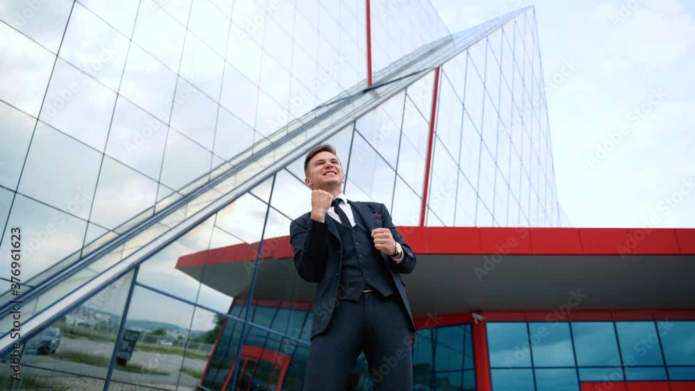 Happy overjoyed caucasian Businessman celebrate good news surprise at ...