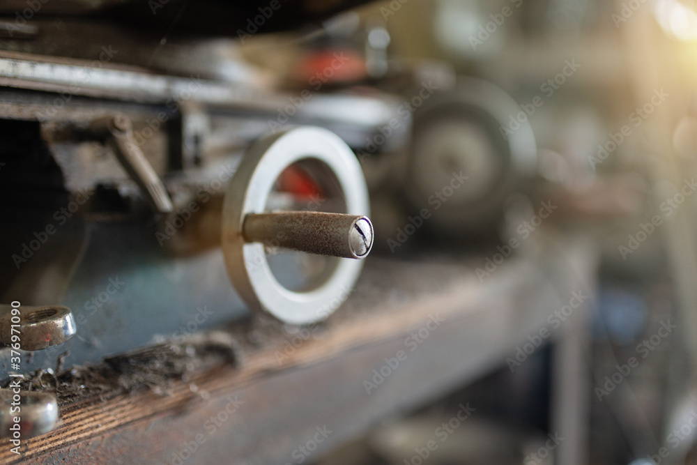 Vise hand wheel of a milling machine with small depth of field (DOF ...