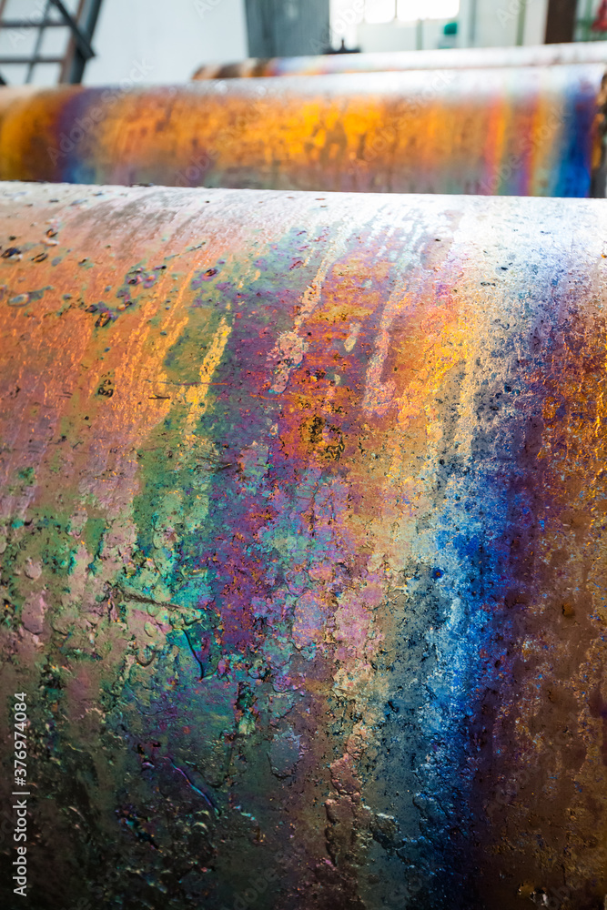 Color surface of titanium metal after melting. Titanium cylinder before ...