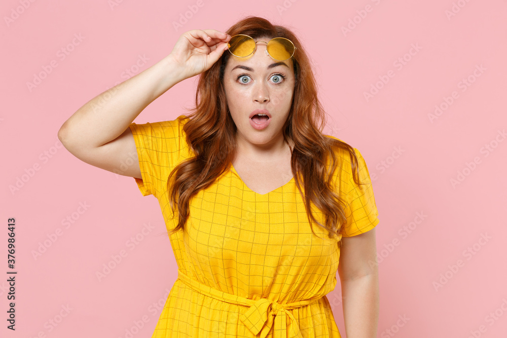 Shocked amazed young redhead plus size body positive female woman 20s ...