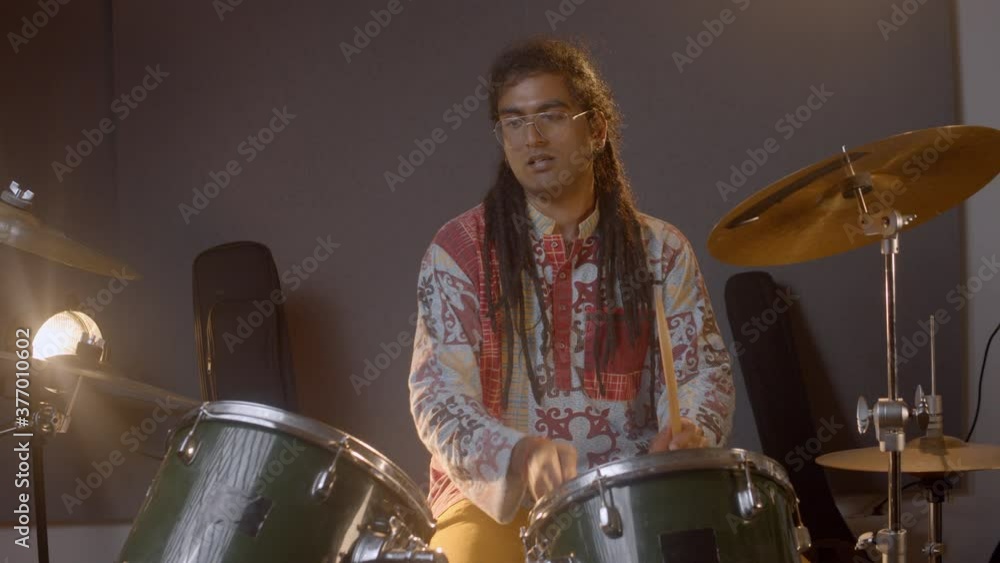 Musician. Traditional Music. Indian man playing drums in the rehearsal ...