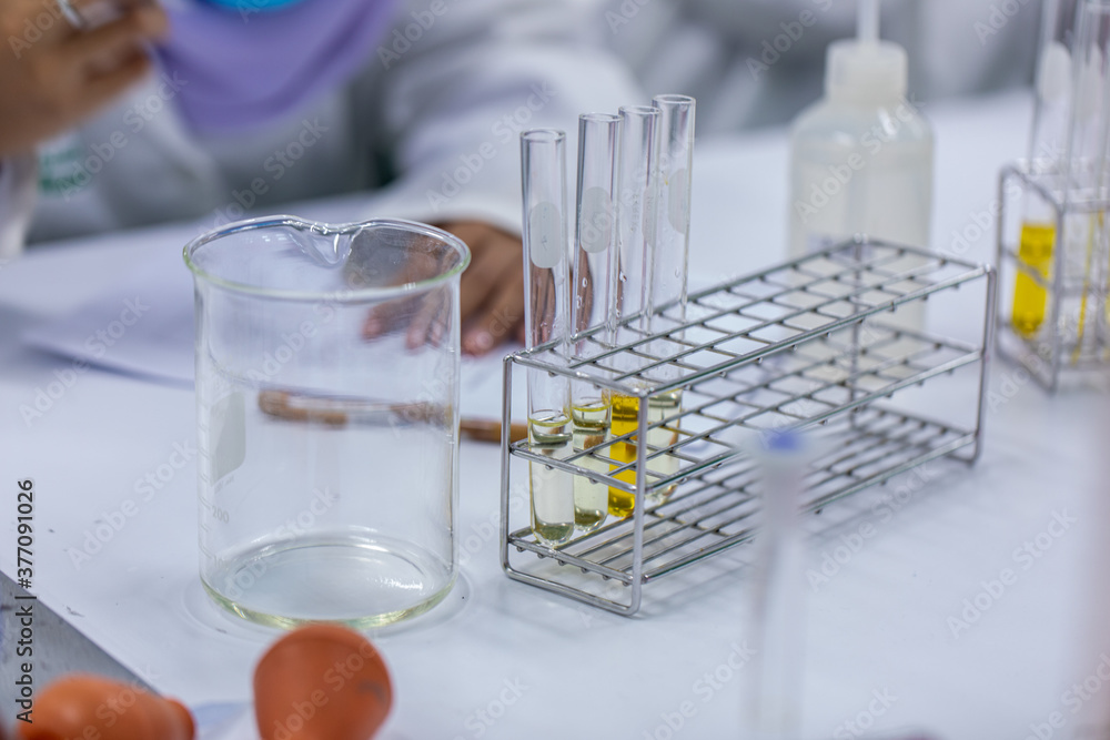 Sample analysis using Spectrophotometer for lab experiments. Stock ...