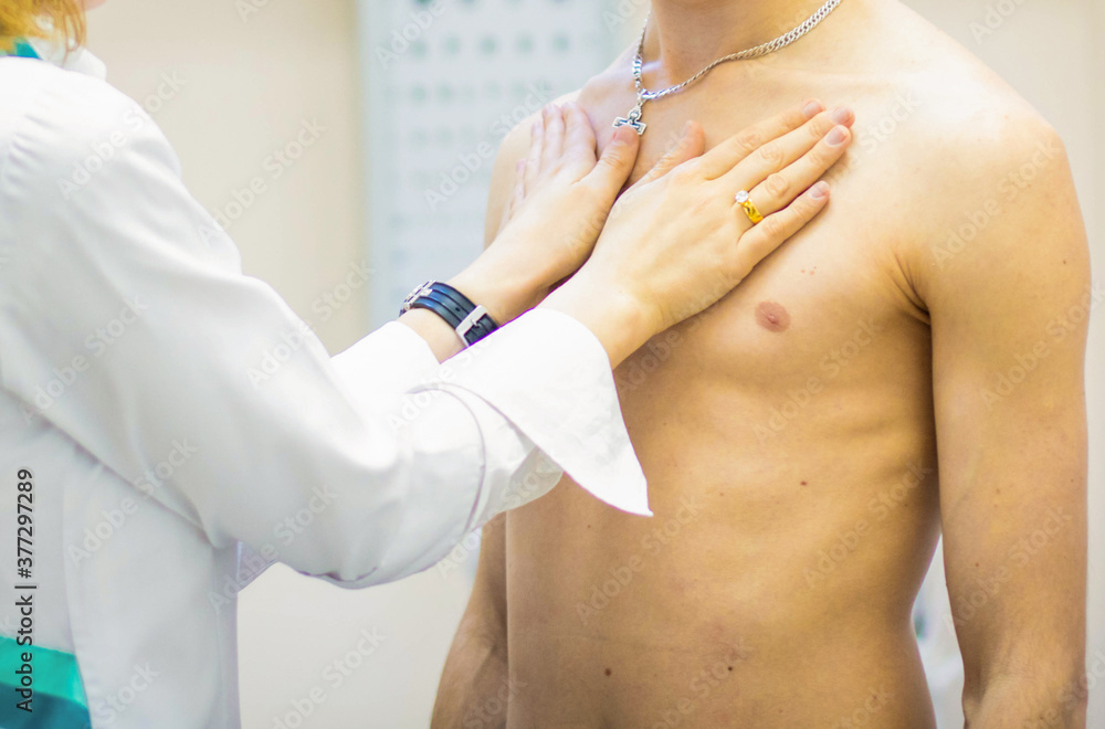 Palpation and percussion of the patient Stock Photo | Adobe Stock