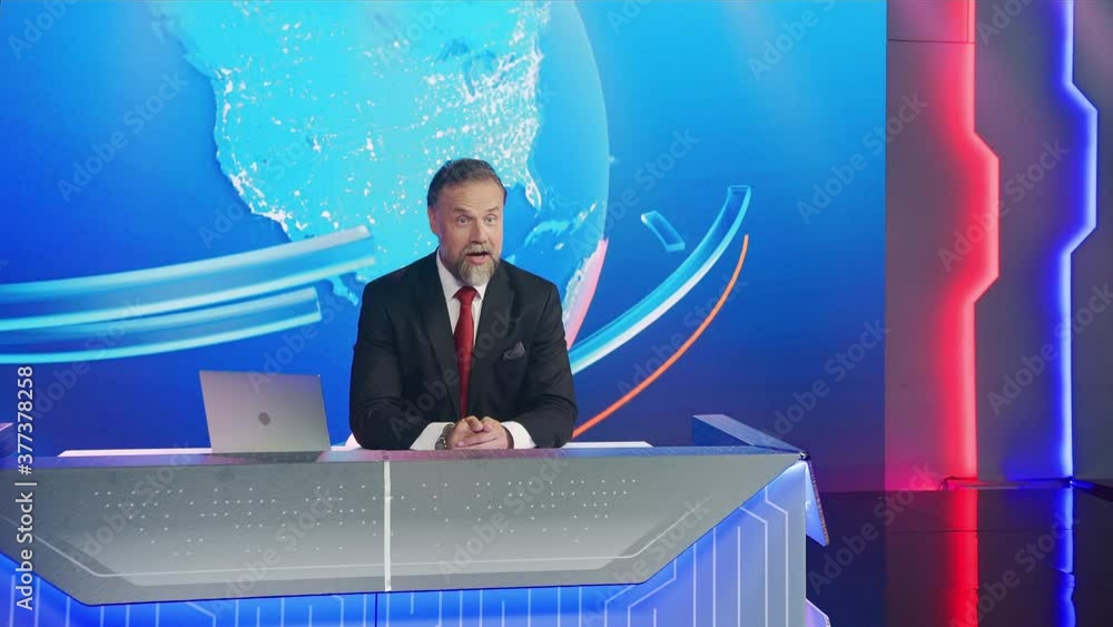 Live News Studio with Handsome Male Newscaster Reporting on the Events ...