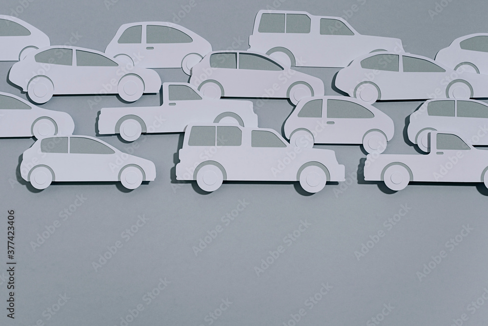 Paper car on grey background Stock Photo | Adobe Stock