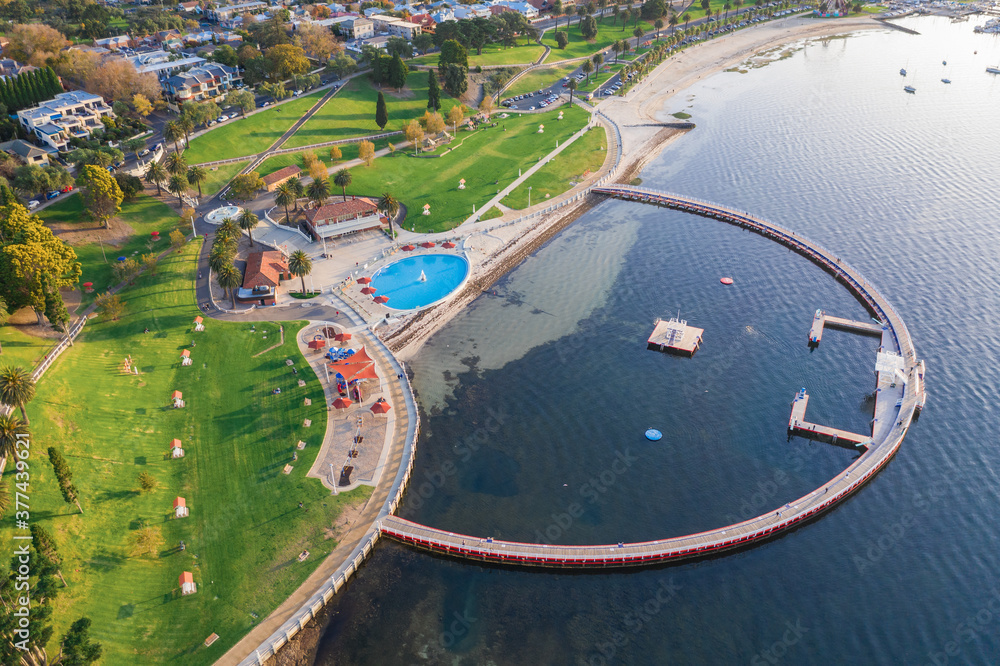 Aerial view of a large circular swimming enclosure along a coastal ...