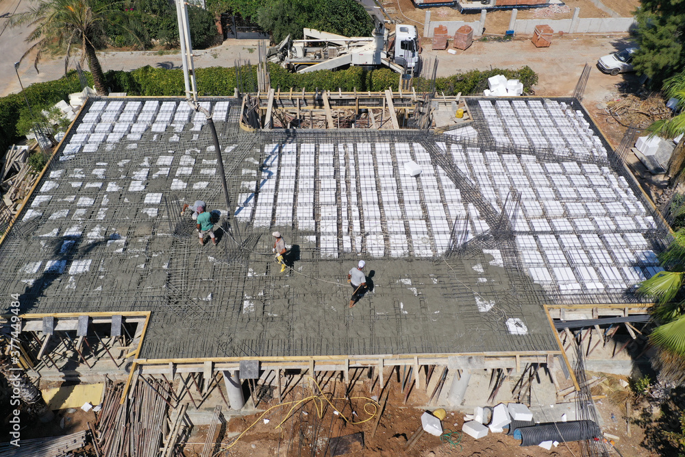 Pouring concrete, commercial concreting floors of buildings in ...
