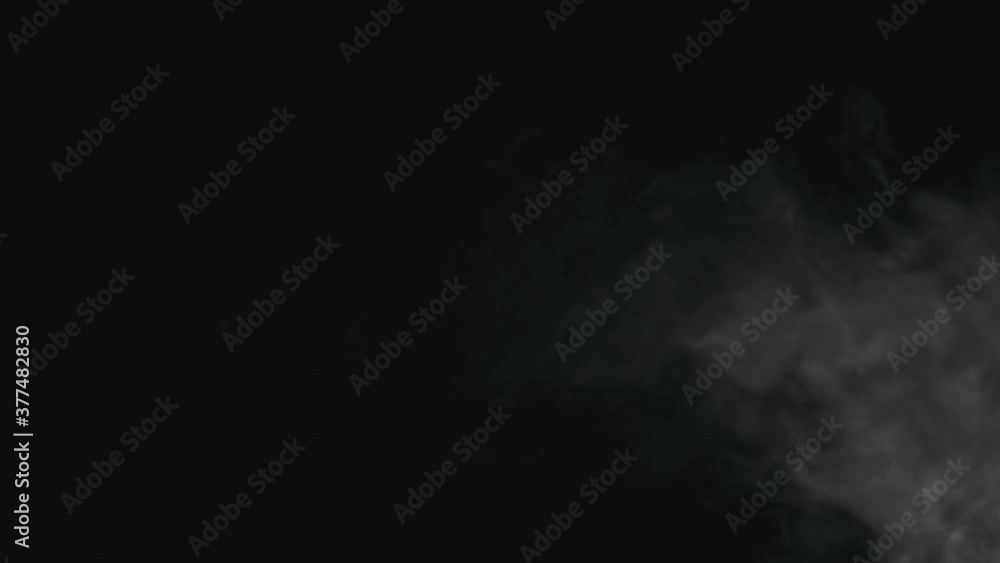 Slow motion water mist puff stream over black background Stock Video ...