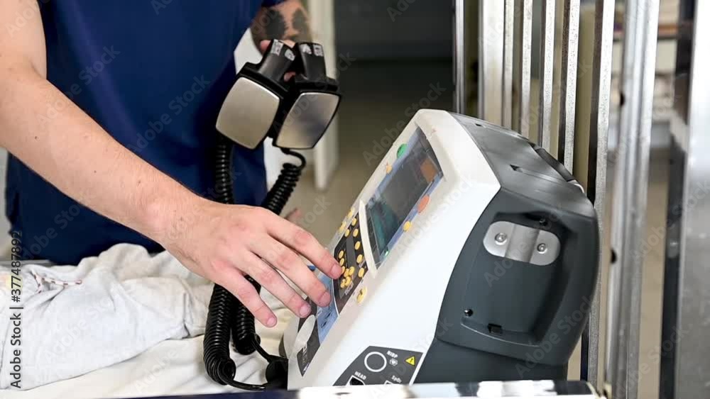 Doctor give resuscitation to a male patient in the emergency room ...