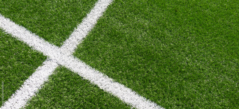 Green artificial grass turf soccer football field background with white ...