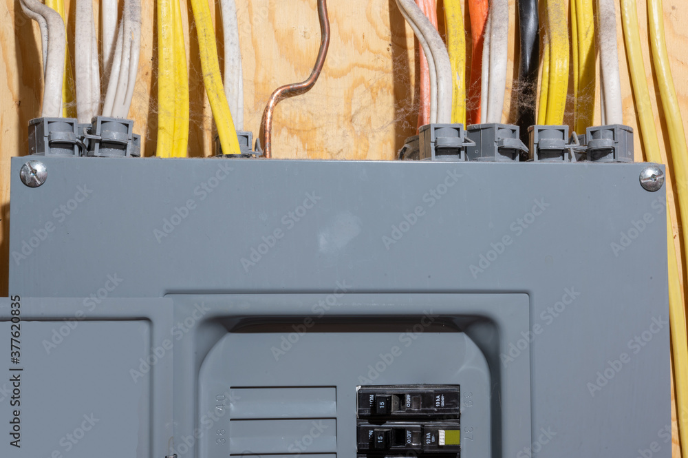Wires leaving a open electrical outlet box Stock Photo | Adobe Stock