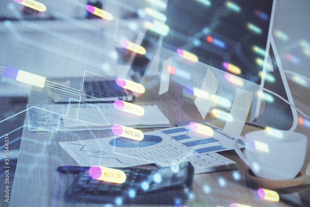 Double exposure of desktop computer and technology theme hologram ...