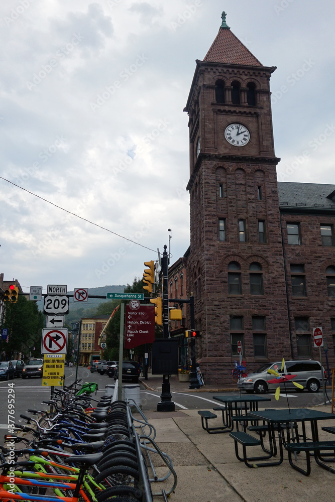 Street intersection in small town with stunning example of red brick ...