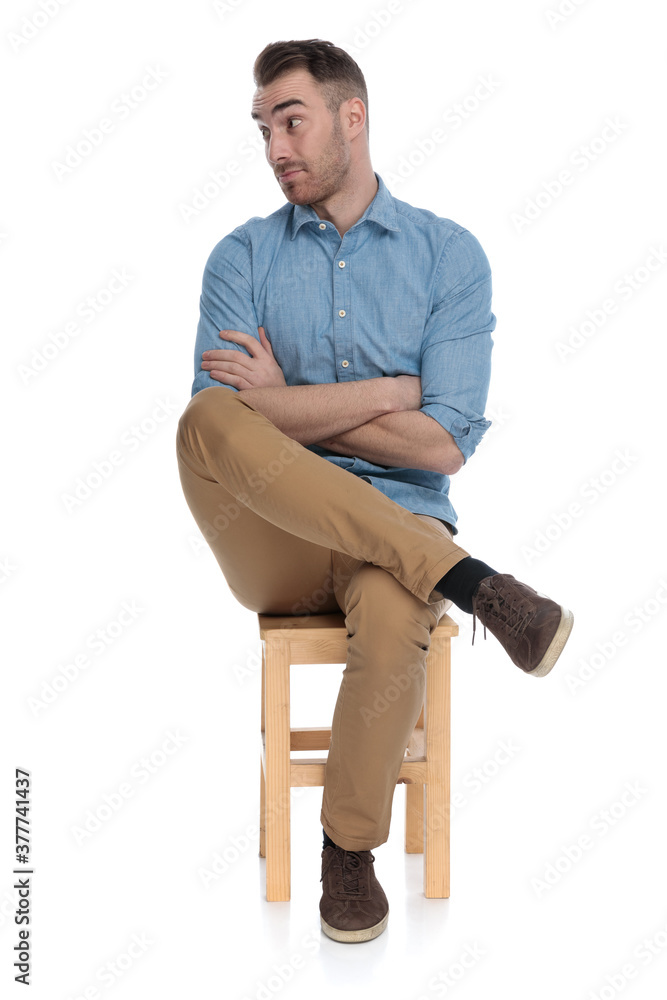 Bothered smart casual man holding his hands crossed and disagreeing ...