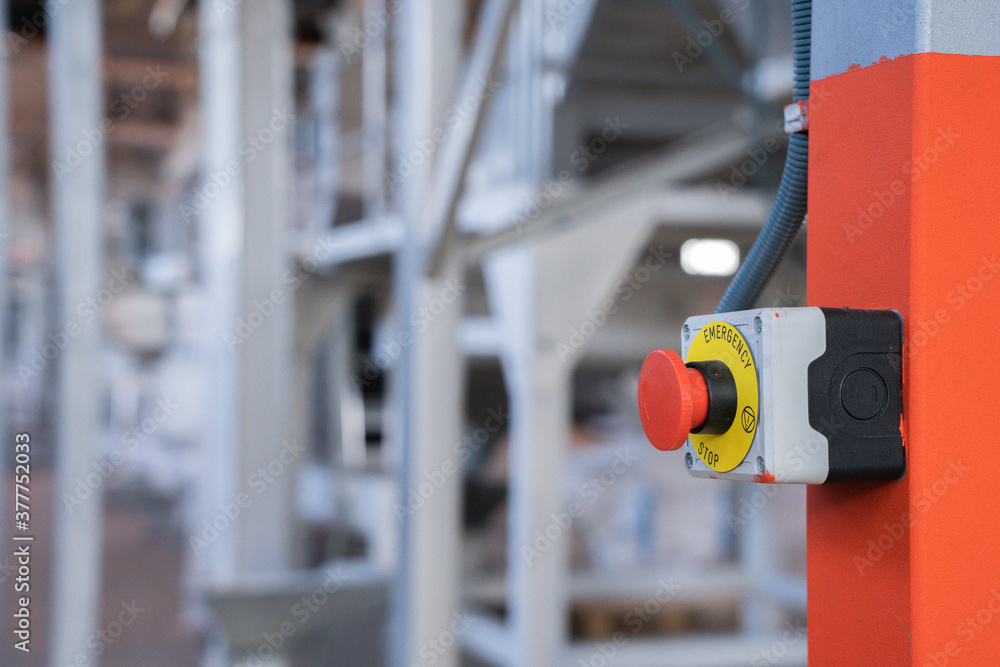 Emergency button in technical production Stock Photo | Adobe Stock